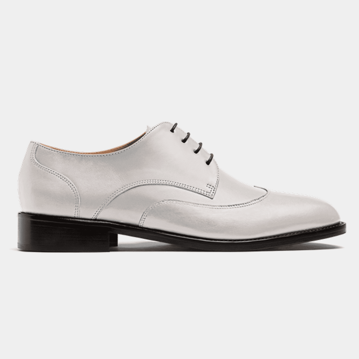Derbies à bout golf en cuir blanc