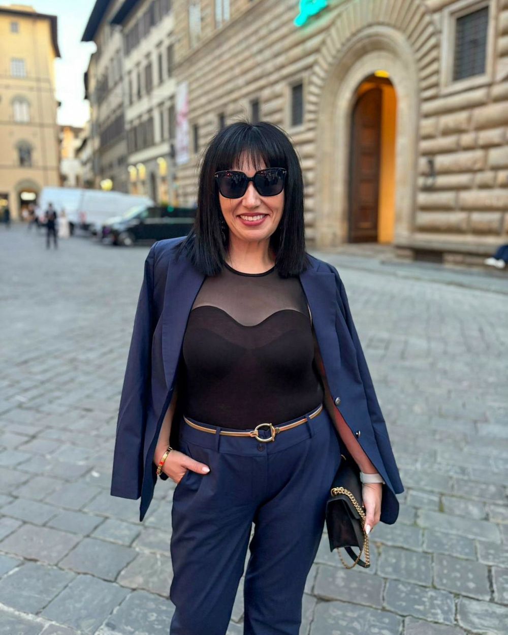 Navy Blue Suit with Sheer Black Bodysuit